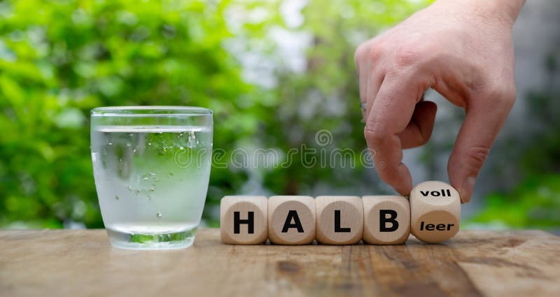 Half empty or half full? stock photo. Image of vision - 293395286