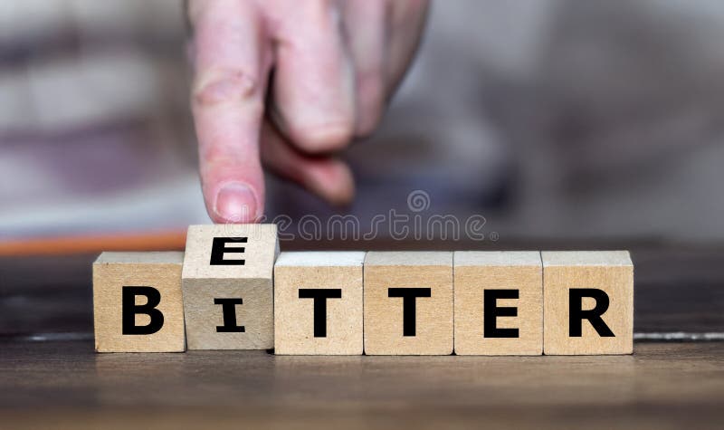 Hand Turns Cube and Changes the Word Bitter To Better. Stock Image ...
