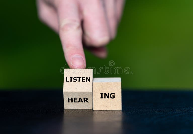 Hand Turns Cube and Changes the Word Hearing To Listening. Stock Image ...