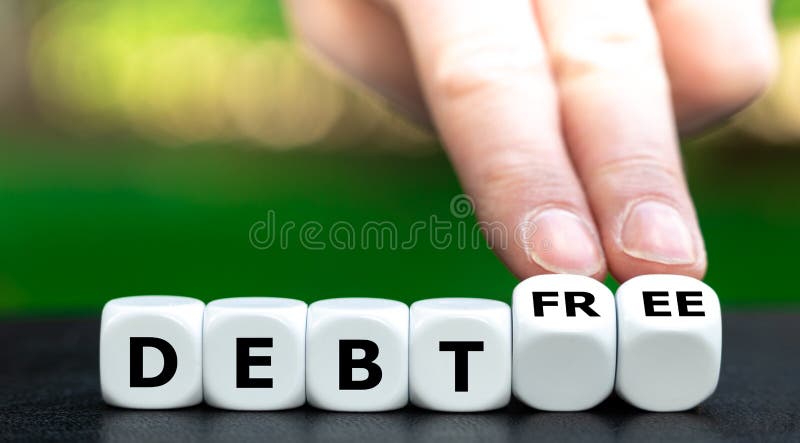 Hand Turns Dice and Changes the Expression `debt` To `debt Free`. Stock ...