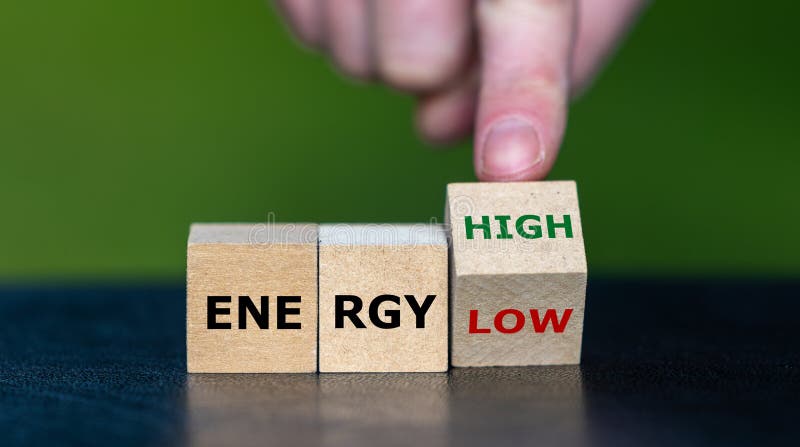 Hand Turns Dice and Changes the Expression Energy Low To Energy High ...