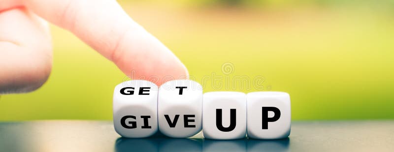 Hand Turns Dice and Changes the Expression `give Up` To `get Up`. Stock ...