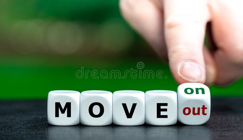 Hand Turns Dice and Changes the Expression `move Out` To `move on ...