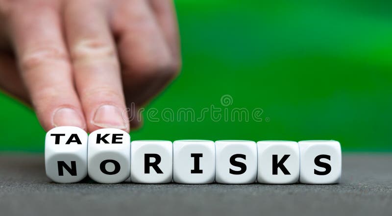 Hand Turns Dice and Changes the Expression `no Risks` To `take Risks ...