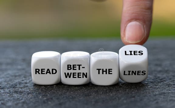 Hand Turns Dice and Changes the Expression `read between the Lines` To ...