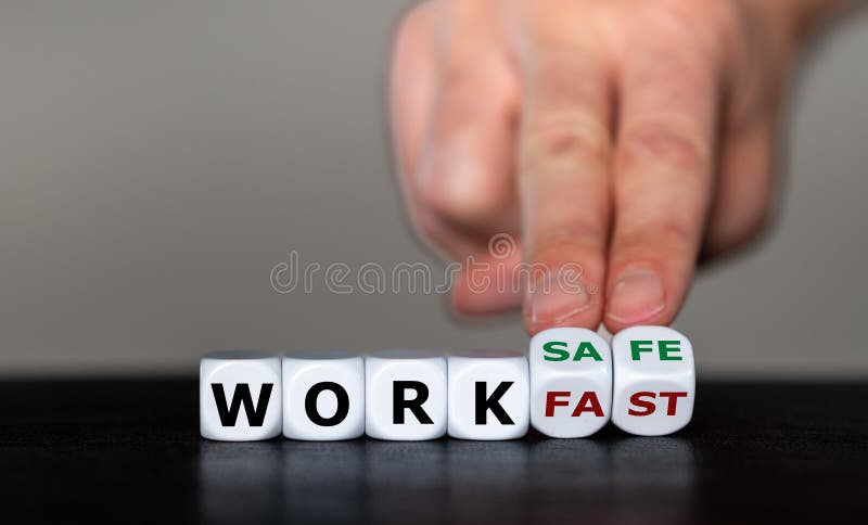 Hand Turns Dice and Changes the Expression `work Fast` To `work Safe ...