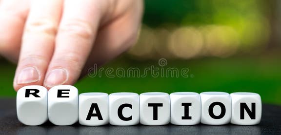 Hand Turns Dice and Changes the Word Action To Reaction. Stock Image ...
