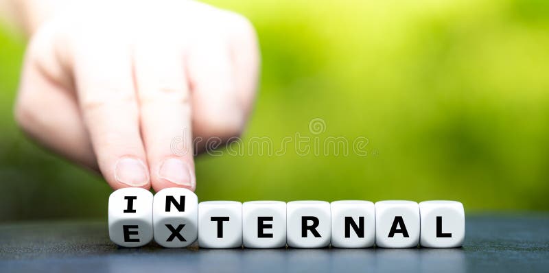 Hand Turns Dice and Changes the Word External To Internal Stock Photo ...