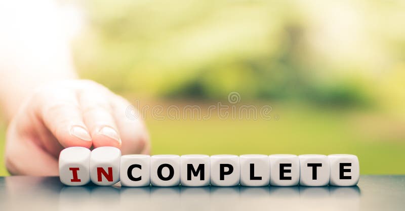 Hand Turns Dice and Changes the Word `incomplete` To `complete`. Stock ...