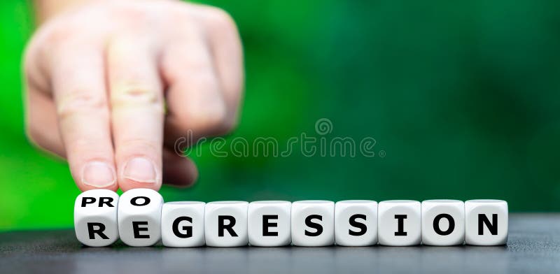 Hand Turns Dice and Changes the Word Regression To Progression Stock ...