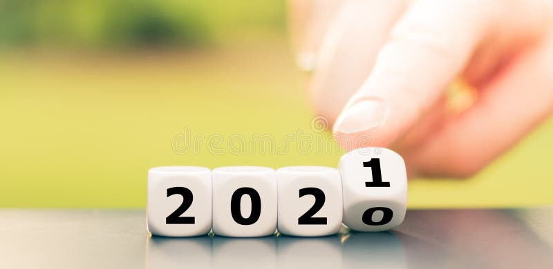 Hand Turns Dice and Changes the Year `2020` To `2021`. Stock Image ...