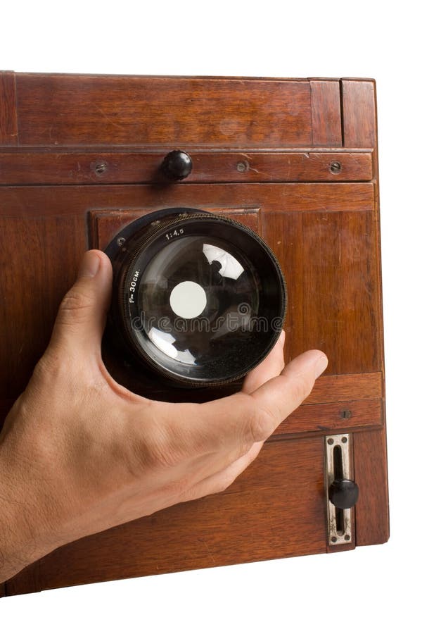Hand Turns the Lens of the Old Wooden Camera Stock Photo - Image of ...