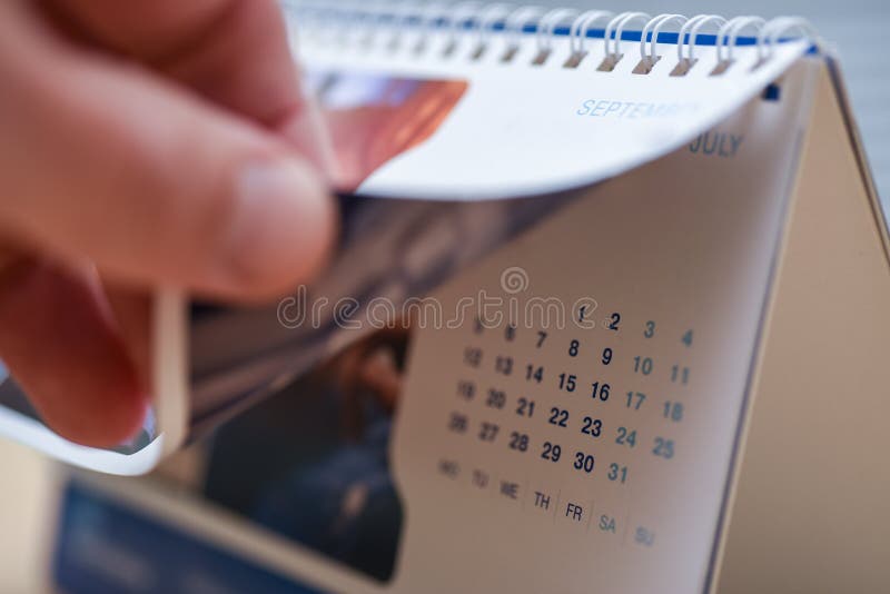 Hand Turns the Page of the Desk Calendar Stock Image - Image of monthly ...