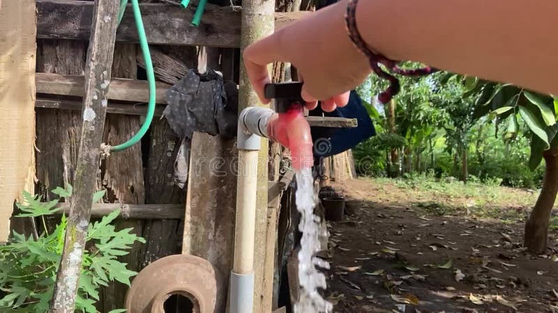 A Hand Turns on the Water Faucet Stock Footage - Video of domestic ...