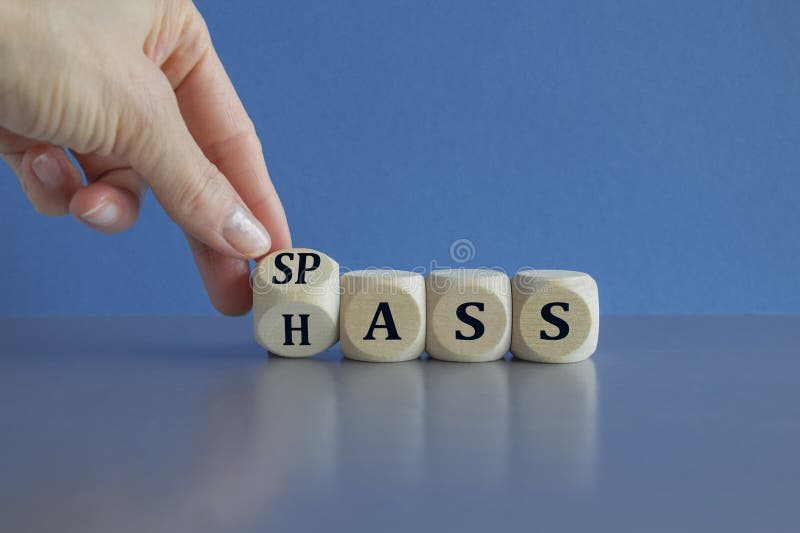 Hand Turns a Wooden Cube and Changes the German Word Hass (hate) To ...