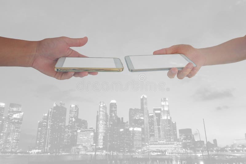 Hand of Two Asian People are Hold Smartphone Close To Each Other for ...