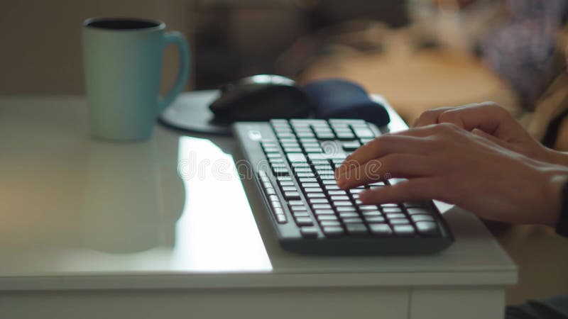 Hand Typing on Computer Keyboard of a Laptop Computer in Home ...