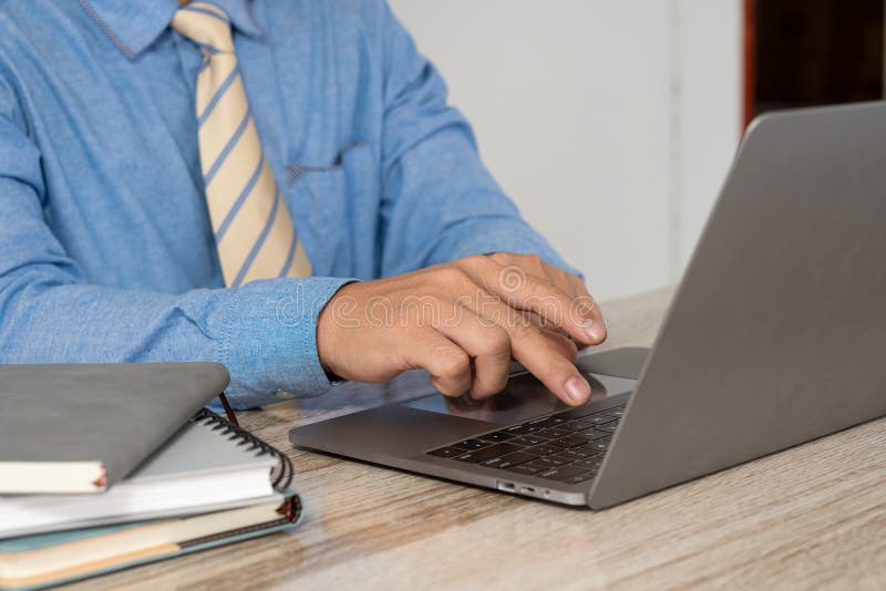 Hand Typing Keyboard Manager Working on the Project in Open Space ...
