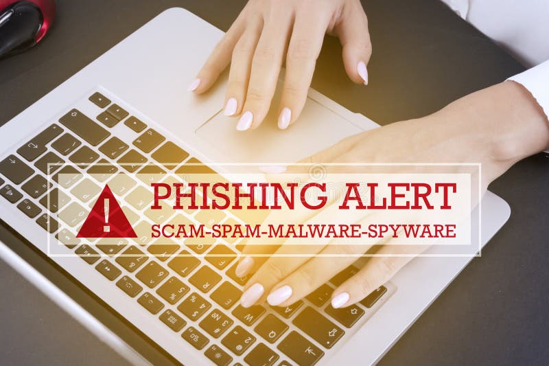 Hand Typing on Keyboard with Text PHISHING ALERT Scam, Spam, Malware ...