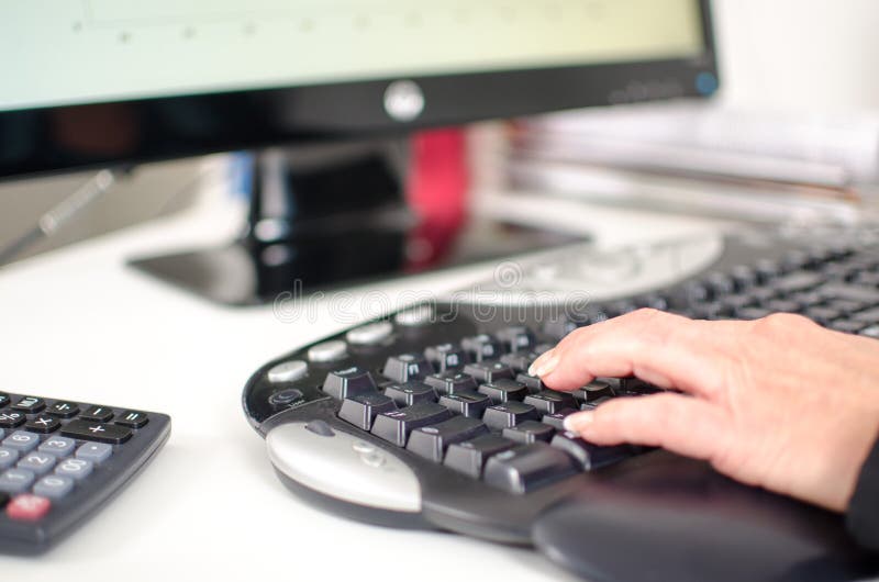 Hand typing on a keyboard stock image. Image of business - 45394833