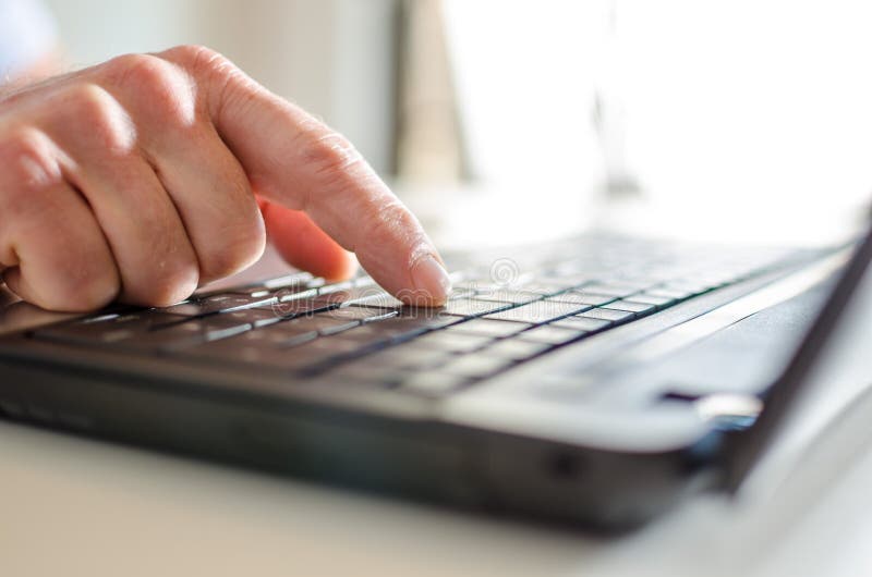 Hand typing on a laptop stock photo. Image of busy, computing - 49549780