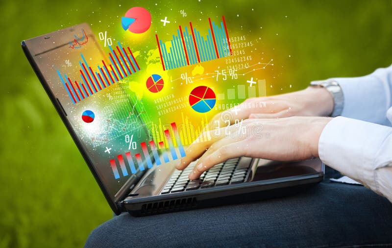 Hand Typing on Modern Laptop Notebook Computer with Graph Icons and ...