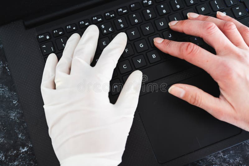 Hand Typing on Shared Computer Keyboard at Work Wearing Disposable ...