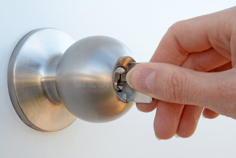Hand unlocking the door stock photo. Image of closed, door - 3021200