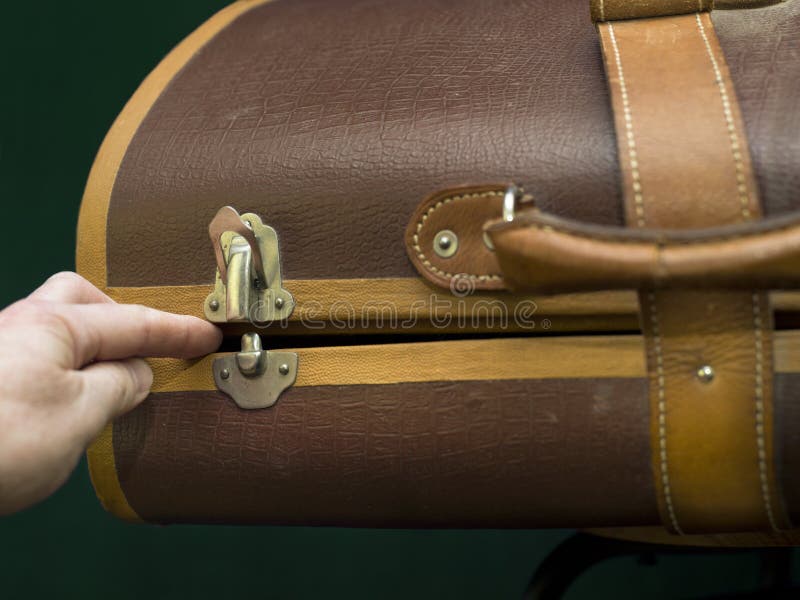 Hand Unlocking Suitcase stock image. Image of suitcase - 107905843