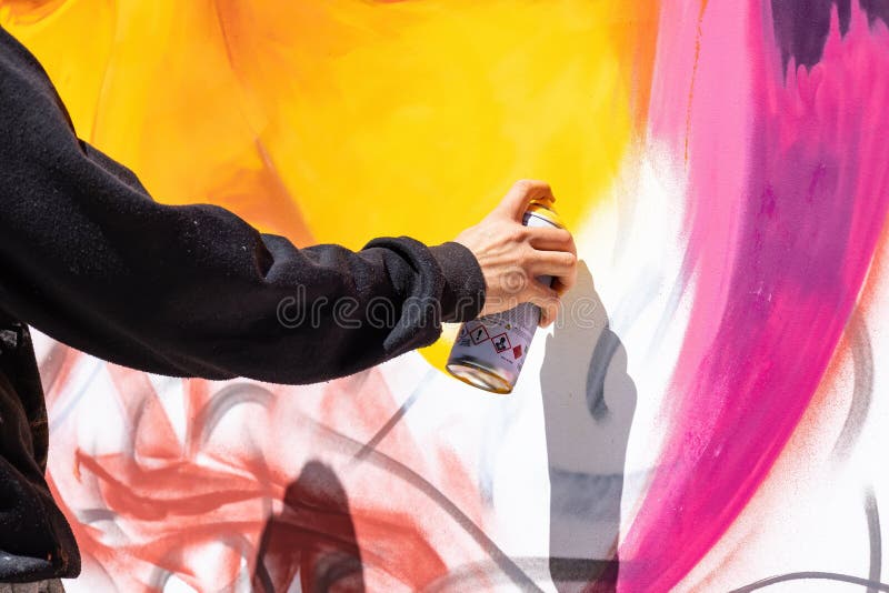 Hand of an Urban Artist Creating a Graffiti Stock Photo - Image of ...