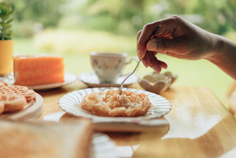 Hand Use Fork Pick Piece of Fresh Roti in Plate. Roti and Dessert ...