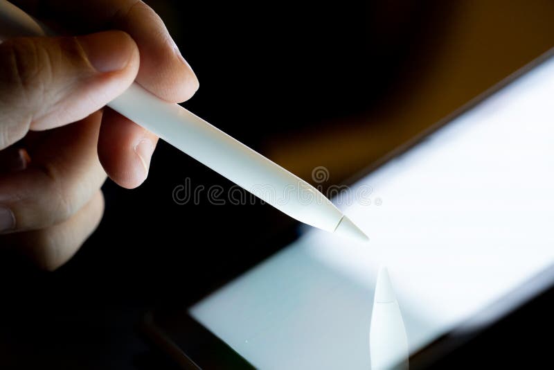 Hand Use Pen Stylus Touch and Drow on Tablet Screen Mock Up with Light ...