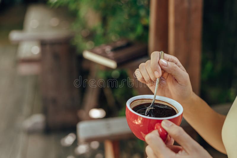 Man Hand Use Spoon Mix Coffee and Sugar in the Morning. Cake and Coffee ...
