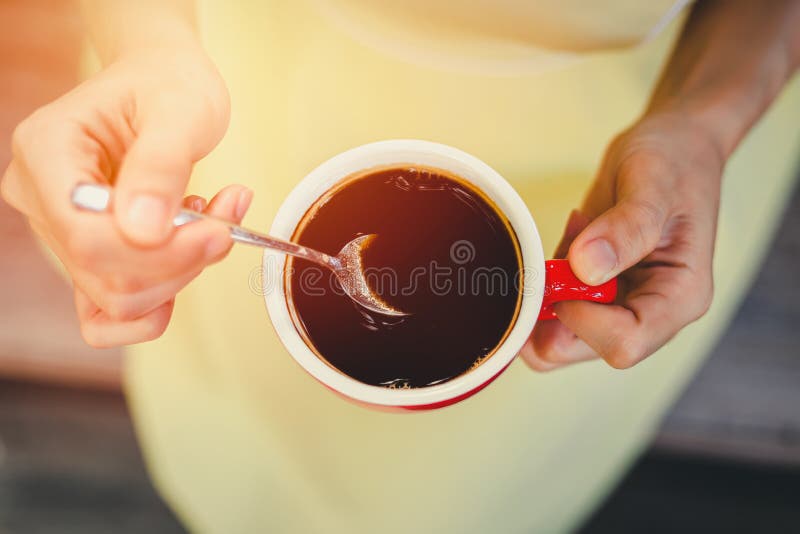 Man Hand Use Spoon Mix Coffee and Sugar in the Morning. Cake and Coffee ...
