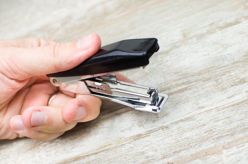 Hand use stapler stock photo. Image of hands, chrome - 61987438