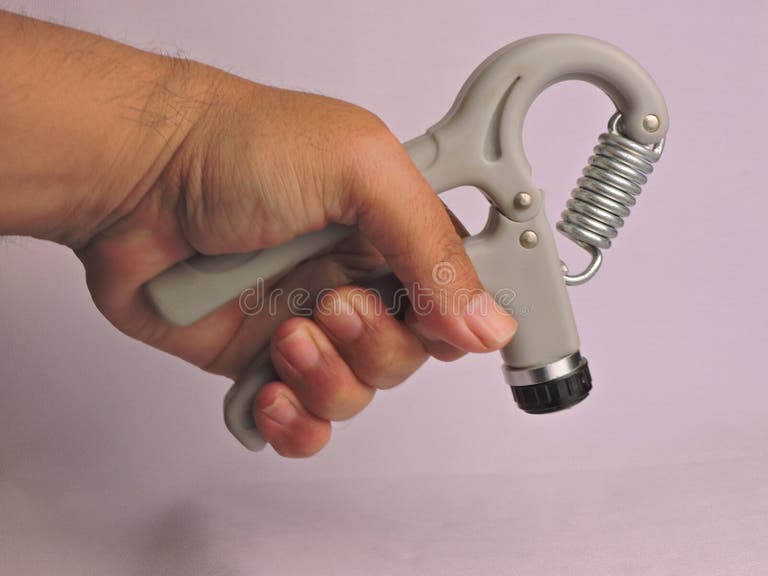 Hand Using Adjustable Grip Strengthener for Exercise Stock Photo ...