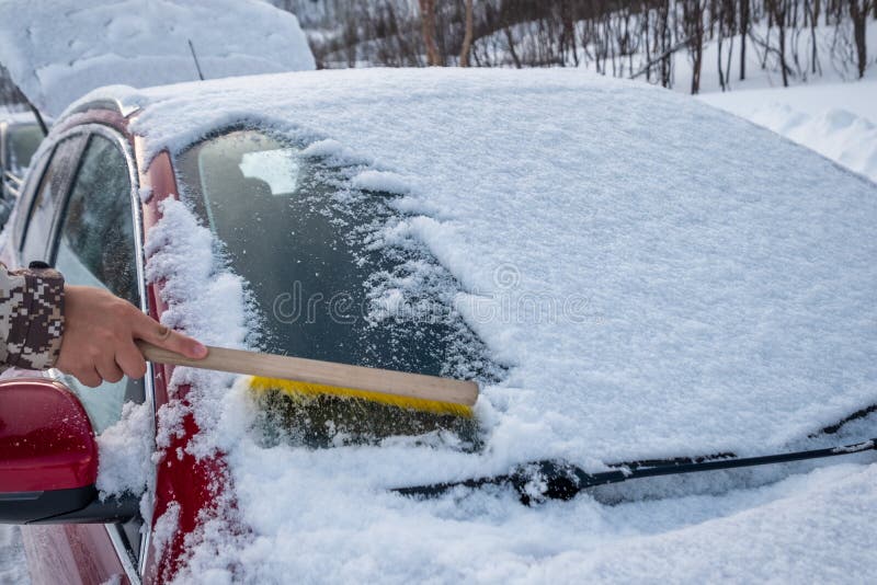 Hand Using Brush Sweeping Snow on Car Windscreen Stock Photo - Image of ...