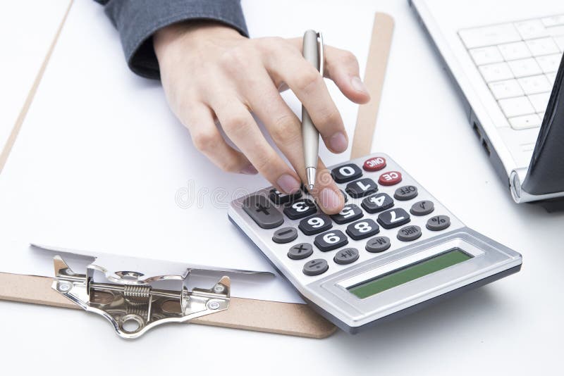 Hand using calculator stock photo. Image of calculator - 85806498