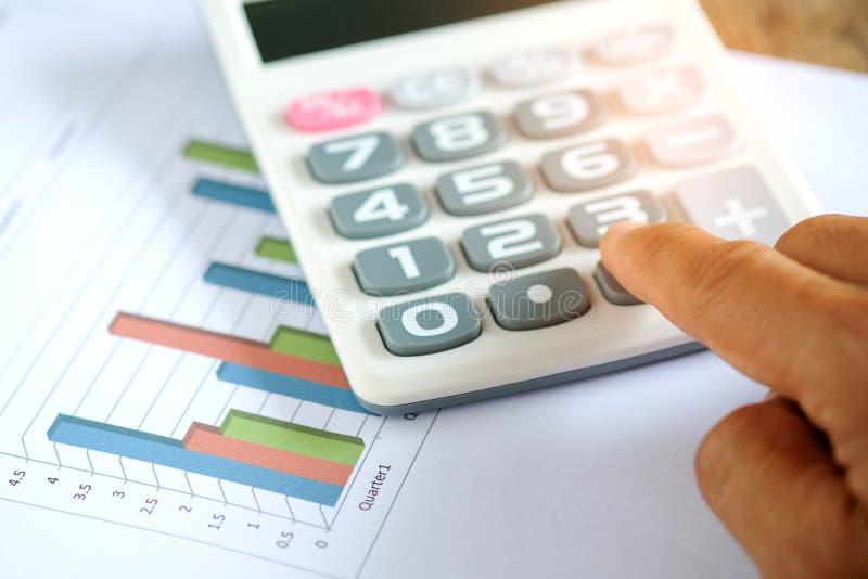 Hand Using Calculator on Graph. Stock Image - Image of performance ...