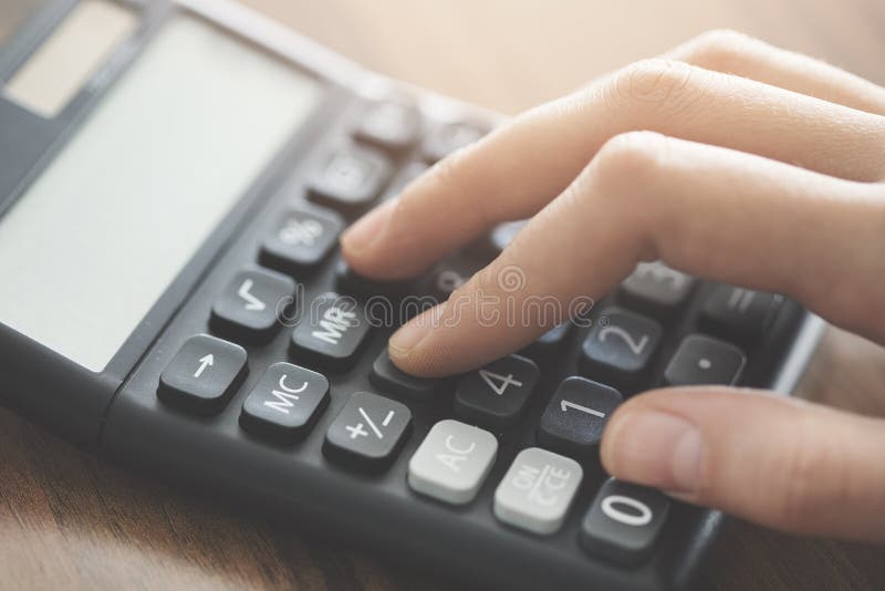 Hand Using Calculator on the Table Stock Image - Image of calculator ...