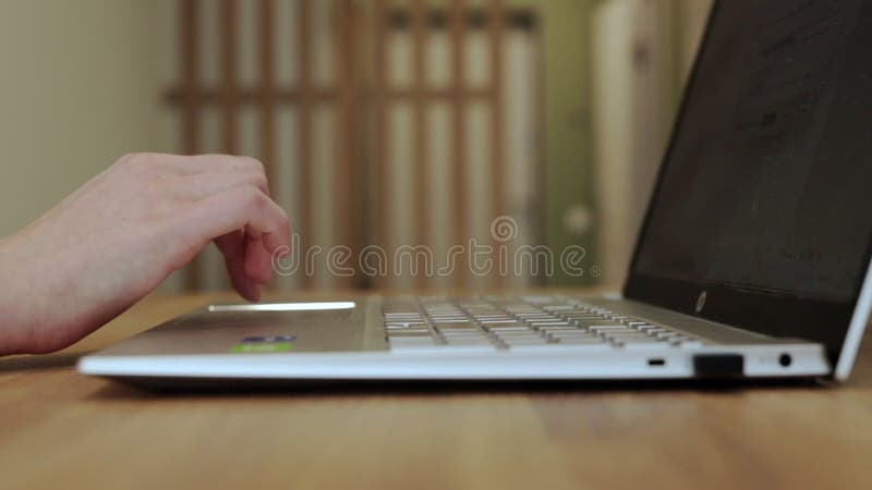Hand Using Laptop, Working at PC on Wood Office Desk. Fingers Scrolling ...