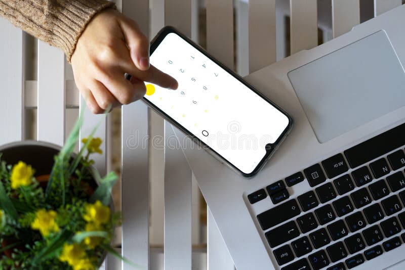 Hand Using Mobile Calculator in the Office Stock Photo - Image of ...