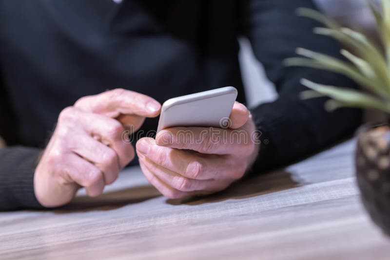 Hand using mobile phone stock photo. Image of telephone - 154185150