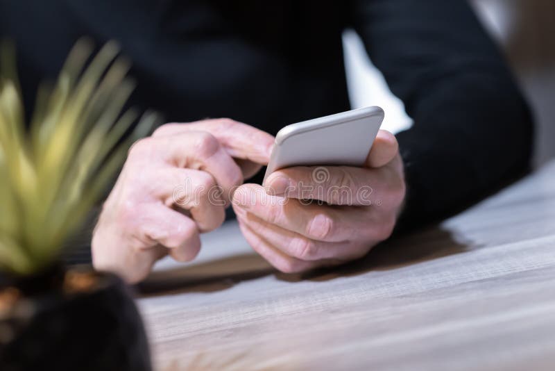 Hand using mobile phone stock photo. Image of device - 155303934