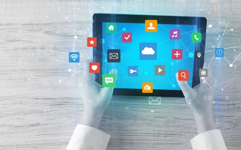 Hand Using Multitask Tablet with Application Symbols and Icons Concept ...