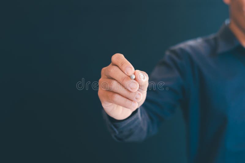 Hand Using a Pen To Point and Take Notes in Work Stock Image - Image of ...