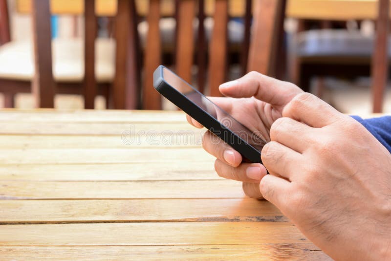 Hand using smartphone stock photo. Image of holding, touch - 51698552