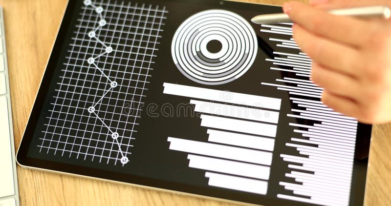 Hand Using Stylus and Checking Data on Growth of Financial Indicators ...