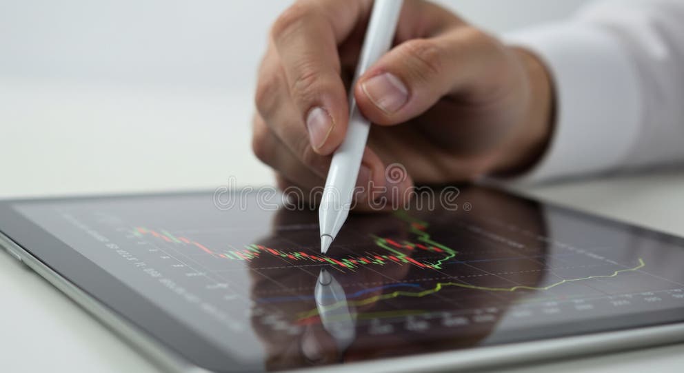 Hand Using Stylus on Tablet Analyzing Stock Market Graph with Precision Stock Image - Image of ...