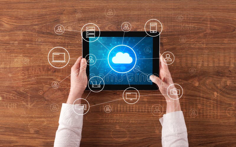 Hand Using Tablet with Centralized Cloud Computing System Concept Stock ...